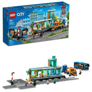 lego city train station set 60335 with bus, rail truck, and tracks, compatible with city sets. pretend play train set for kids who love pretend play