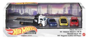 hot wheels premium collect display sets with 3 1:64 scale die-cast cars & 1 team transport vehicle, collectors’ favorites, 2 sets in the assortment for collectors of all ages