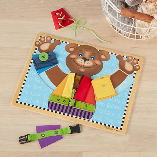 Melissa & Doug Basic Skills Puzzle Board - Wooden Educational Toy - Learn To Button Busy Board, Activity Board For Fine Motor Skills, Developmental Toy For Toddlers Ages 3+