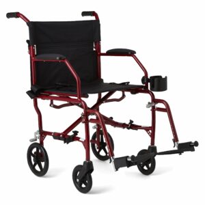 medline ultra lightweight transport wheelchair for adults, foldable, 19-inch seat width, red frame, black upholstery