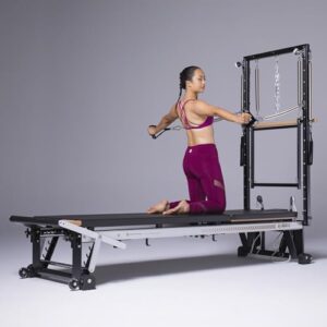 Merrithew™ V2 Max Plus™ Reformer Bundle with Mat Converter, Reformer Box, Footstrap, Padded Platform Extender & Maple Roll-Up Pole - Professional Pilates Equipment