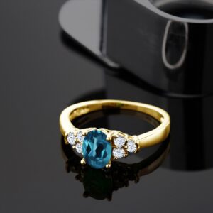 Gem Stone King 18K Yellow Gold Plated Silver London Blue Topaz and White Topaz Ring For Women (0.79 Cttw, Oval Gemstone Birthstone, Available In Size 5, 6, 7, 8, 9)