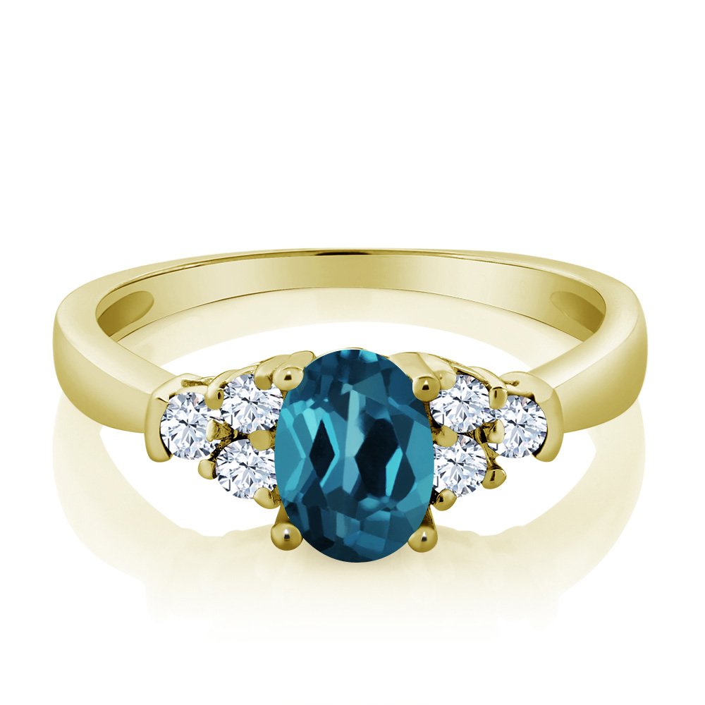 Gem Stone King 18K Yellow Gold Plated Silver London Blue Topaz and White Topaz Ring For Women (0.79 Cttw, Oval Gemstone Birthstone, Available In Size 5, 6, 7, 8, 9)