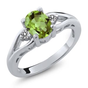 gem stone king 925 sterling silver green peridot and white topaz 3 stone ring for women | 1.50 cttw | gemstone birthstone | oval 8x6mm | available in size 5,6,7,8,9