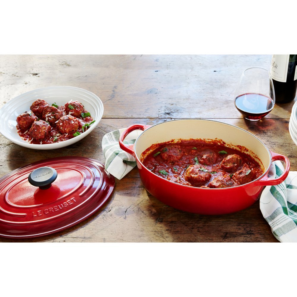 Le Creuset Enameled Cast Iron Signature Oval Dutch Oven, 9.5 qt., Cerise