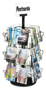 post card display stand with 24 pockets for countertop use, 28-1/4 inches tall, black rotating wire rack with molded plastic base and sign clip