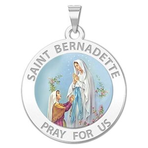 picturesongold.com saint bernadette religious medal color - 2/3 inch size of dime, sterling silver