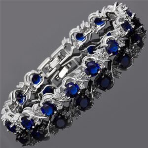 RIZILIA Blossom Round Simulated Blue Sapphire and White Cubic Zirconia 18K White Gold Plated Tennis Bracelet, 7"