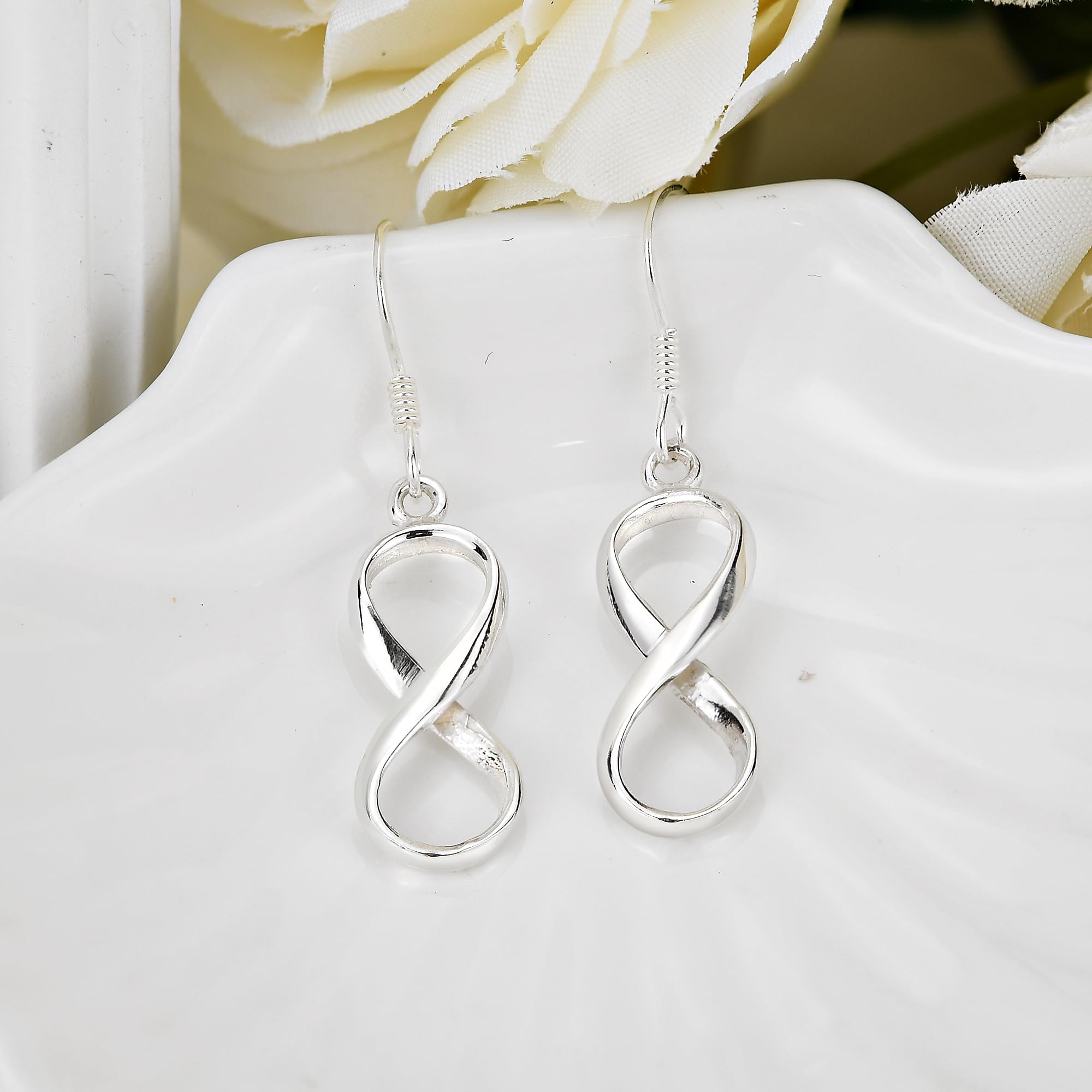 AeraVida Endless Symbol Infinity Love .925 Sterling Silver Dangle Earrings