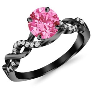 0.63 carat 14k black gold twisting infinity gold and diamond split shank pave set diamond engagement ring with a 0.5 carat natural pink sapphire center (heirloom quality)