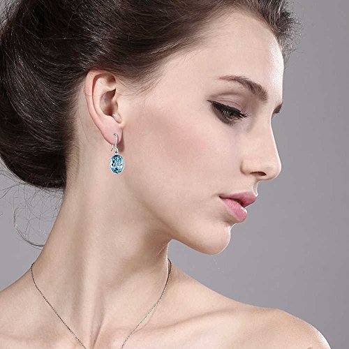 Gem Stone King 925 Sterling Silver Blue Topaz Dangle Earrings For Women (14.00 Cttw, Gemstone Birthstone, Oval 10X14MM)