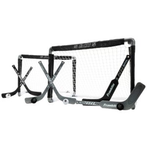 franklin sports nhl mini hockey goal set of 2 - black - includes mini hockey goals, 4 hockey sticks, 2 goalie sticks, and 4 foam hockey balls