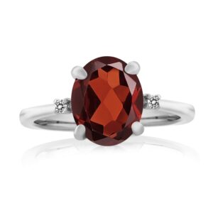 Gem Stone King 925 Sterling Silver Red Garnet and White Diamond Engagement Ring For Women | 2.83 Cttw | Oval 10X8MM | Gemstone Birthstone | Available 5,6,7,8,9 (Size 9)