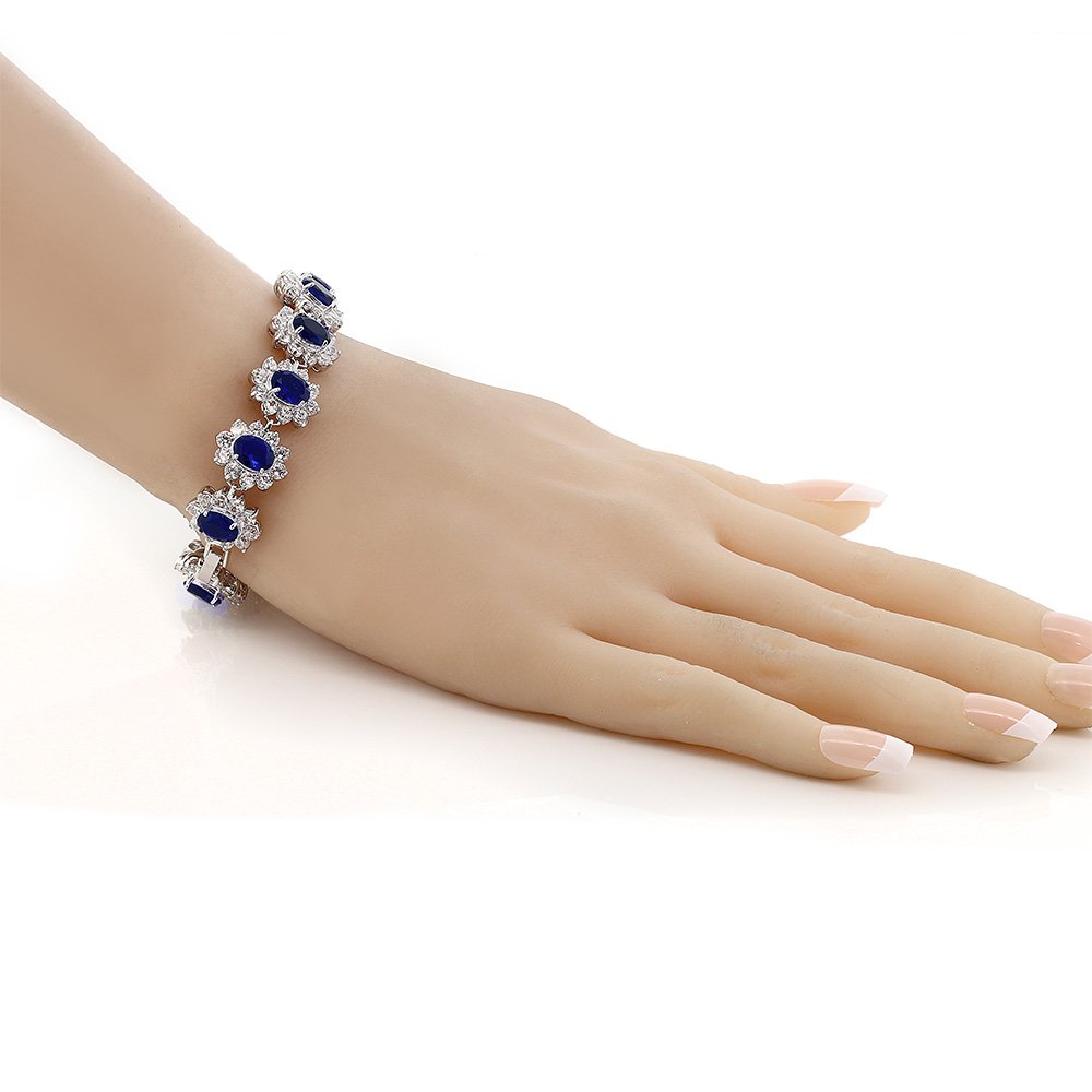 Gem Stone King 27.00 Cttw Royal Blue Simulated Sapphire and White CZ Tennis Bracelet For Women | 8X6MM Oval and 3MM Round | 7 Inch with Security Clasp