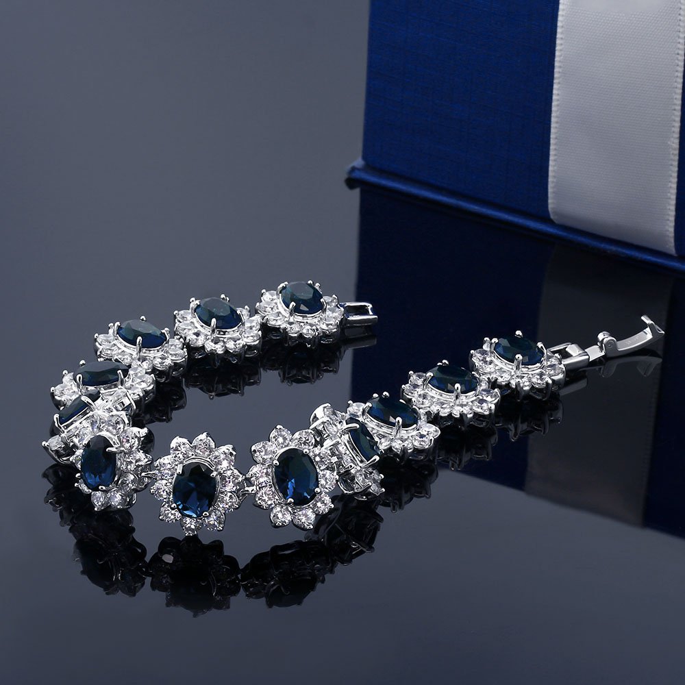 Gem Stone King 27.00 Cttw Royal Blue Simulated Sapphire and White CZ Tennis Bracelet For Women | 8X6MM Oval and 3MM Round | 7 Inch with Security Clasp