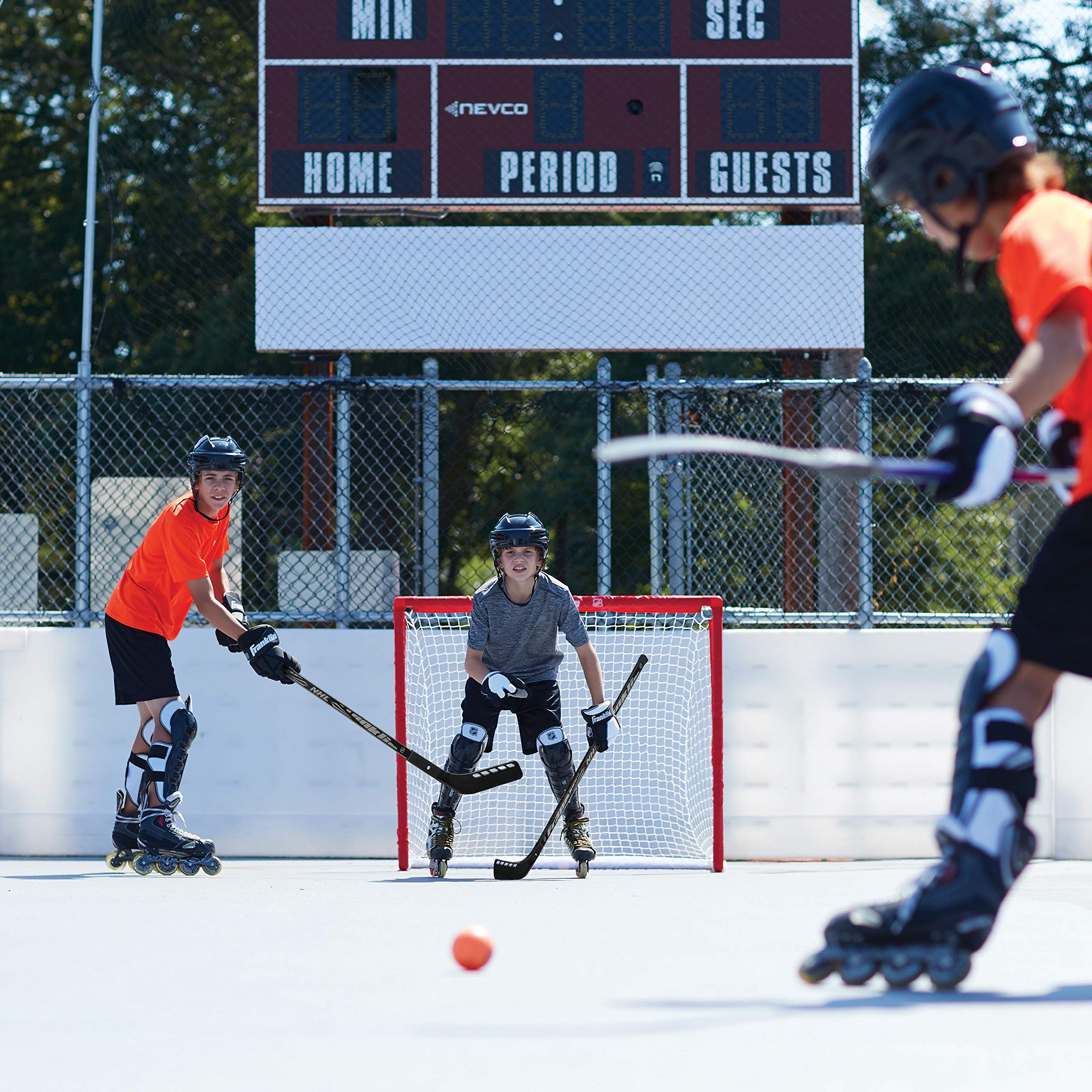 Franklin Sports NHL Youth Street Hockey Set - (2) Kids Junior Hockey Sticks, PVC Goal + Roller Hockey Ball Included - Indoor + Outdoor Net - 46", Red