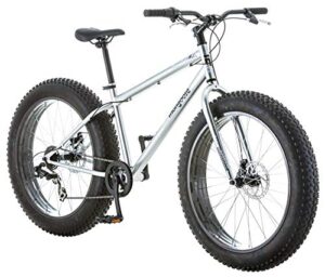 mongoose malus mens and womens fat tire mountain bike, 26-inch bicycle wheels, 4-inch wide knobby tires, steel frame, 7 speed drivetrain bicycle, shimano rear derailleur, disc brakes, silver/black