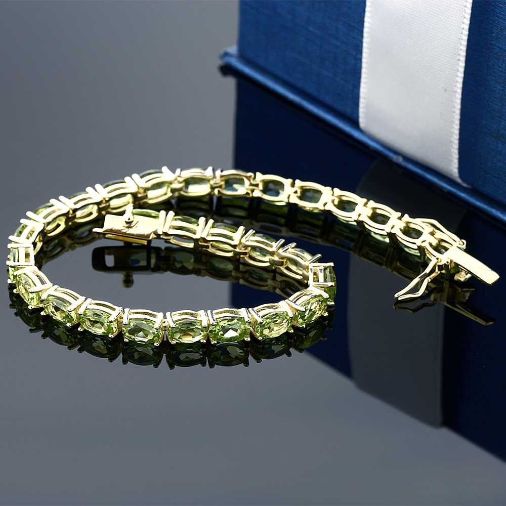 Gem Stone King Green Peridot Tennis Bracelet For Women in 925 Sterling Silver | 12.00 Cttw | Gemstone Birthstone | Oval 6X4MM | Length - 7 Inch