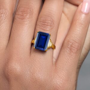 Gem Stone King 18K Yellow Gold Plated Silver Blue Created Sapphire Ring For Women (10.00 Cttw, Emerald Cut 14X10MM, Gemstone September Birthstone, Available In Size 5, 6, 7, 8, 9)