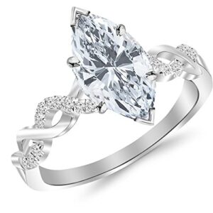 1.13 carat t.w. twisting infinity gold and diamond split shank pave set diamond engagement ring with a 1 ct forever classic marquise moissanite center