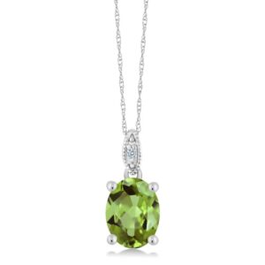 Gem Stone King 10K White Gold Green Peridot and Diamond Pendant Necklace For Women (1.80 Cttw, Gemstone Birthstone, Oval 9X7MM With 18 Inch Chain)