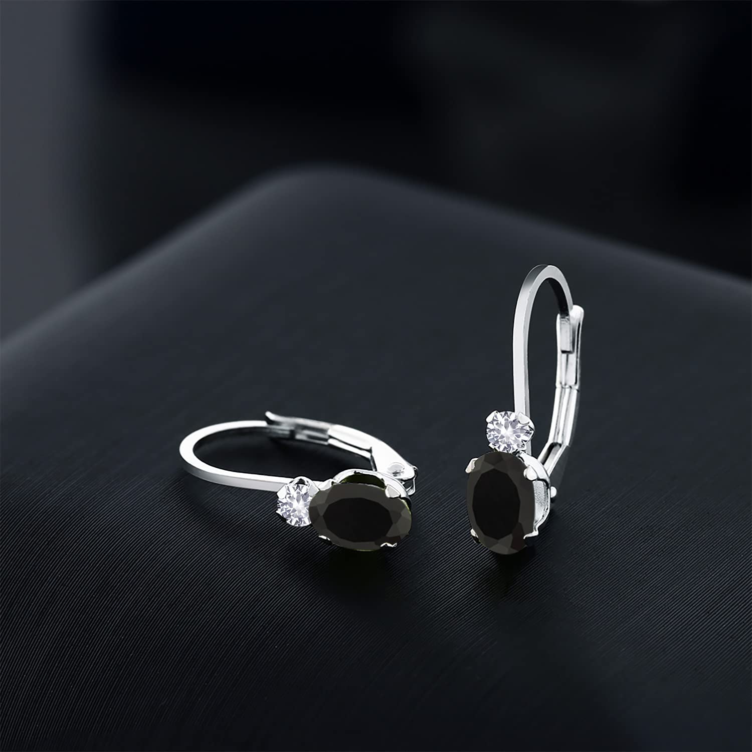 Gem Stone King 925 Sterling Silver Black Onyx and White Created Sapphire Leverback Earrings For Women (0.86 Cttw, Gemstone December Birthstone, Oval 6X4MM, Round 2MM, 3/4 Inch)