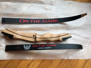 otm signature on the mark archery recurve bow (left)