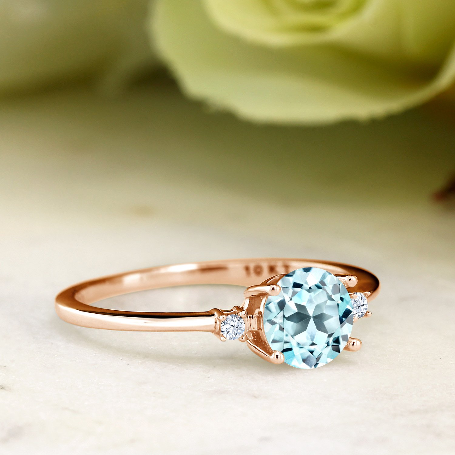 Gem Stone King 10K Rose Gold Sky Blue Topaz and White Created Sapphire Solitaire Engagement Ring For Women (0.93 Cttw, Round 6MM, Gemstone November Birthstone, Size 7)