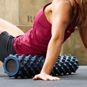 RumbleRoller - Compact 12 Inches - Black - Extra Firm - Textured Muscle Foam Roller - Relieve Sore Muscles- Your Own Portable Massage Therapist - Patented Foam Roller Technology…