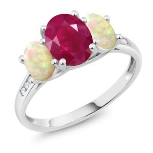 gem stone king 10k white gold red ruby white ethiopian opal and white diamond oval 3-stone engagement ring for women (2.24 cttw, gemstone july birthstone, available in size 5, 6, 7, 8, 9)