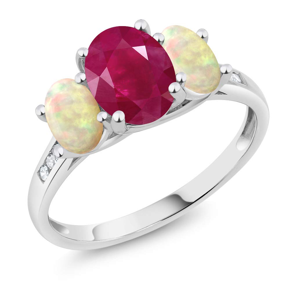 Gem Stone King 10K White Gold Red Ruby White Ethiopian Opal and White Diamond Oval 3-Stone Engagement Ring For Women (2.24 Cttw, Gemstone July Birthstone, Available In Size 5, 6, 7, 8, 9)