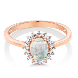 Gem Stone King 10K Rose Gold Cabochon White Simulated Opal and White Created Sapphire Engagement Ring For Women (0.87 Cttw, Available In Size 5, 6, 7, 8, 9)