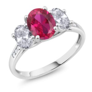 gem stone king 10k white gold red created ruby white topaz and white diamond oval 3-stone engagement ring for women (2.15 cttw, gemstone july birthstone, available in size 5, 6, 7, 8, 9)