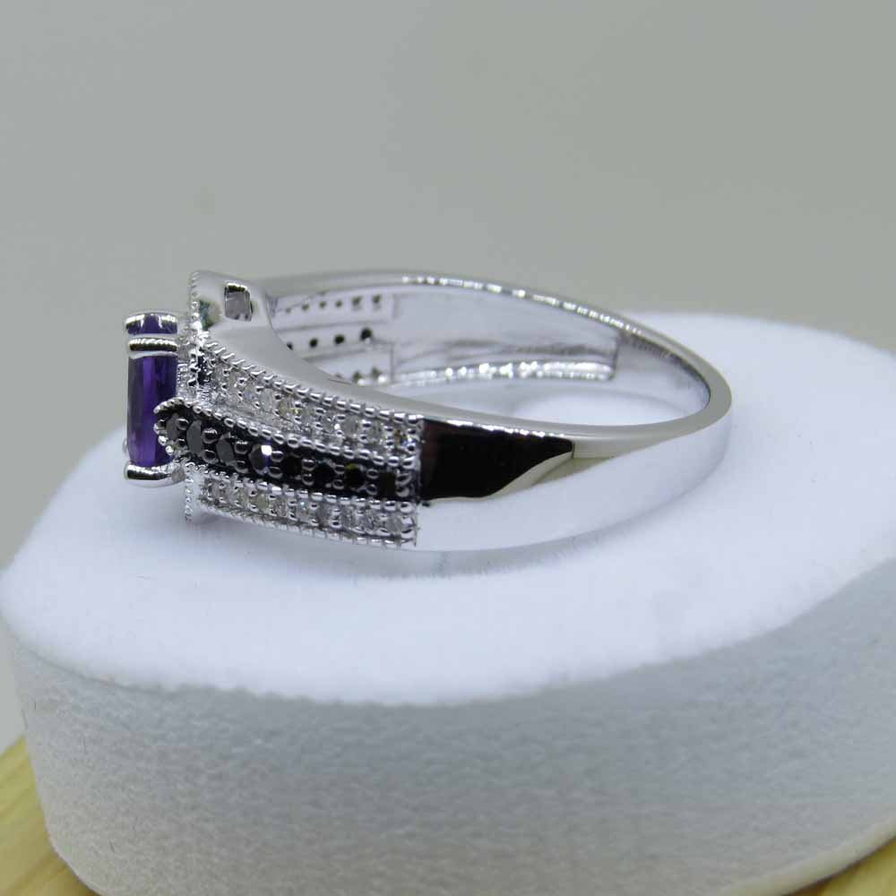 Dazzlingrock Collection Sterling Silver 7X5 Oval Cut Amethyst & Round Black & White Diamond Engagement Ring, Size 5