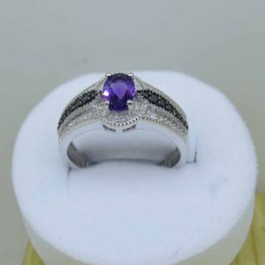 Dazzlingrock Collection Sterling Silver 7X5 Oval Cut Amethyst & Round Black & White Diamond Engagement Ring, Size 5