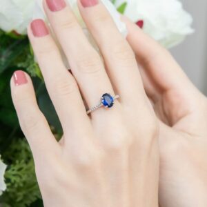 B. BRILLIANT Sterling Silver Created Blue Sapphire and White Topaz Oval Crown Ring, Size 10