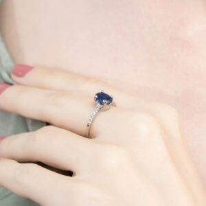 B. BRILLIANT Sterling Silver Created Blue Sapphire and White Topaz Oval Crown Ring, Size 10