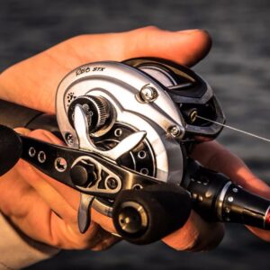 Abu Garcia Revo STX Low Profile Baitcast Reel, Size LP (1430425), 10 Stainless Steel Ball Bearings + 1 DuraClutch Roller Bearing, Strong and Lightweight