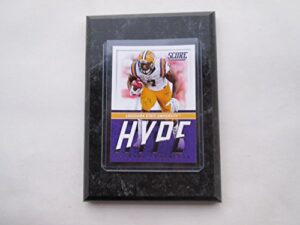 leonard fournette lsu -jacksonville jaguars 2017 score hype rookie card mounted on a "4 x 6" black marble plaque