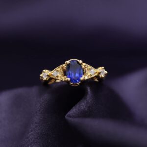 AFFY Oval Cut Simulated Blue Sapphire & Cubic Zirconia Fashion Ring in 14k Yellow Gold Over Sterling Silver Ring Size - 5