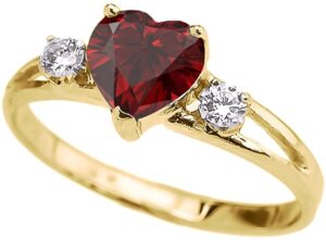 14k yellow gold heart shape garnet & white topaz split shank three stone ring - size 5