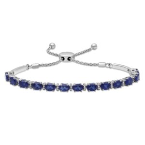 jewelili sterling silver 6x4mm oval created ceylon sapphire and round white topaz bolo bracelet, 9.5"