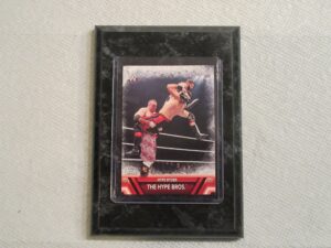 the hype bros wrestlemania topps wwe 2017 hype ryder card mounted on a 4" x 6" black marble plaque