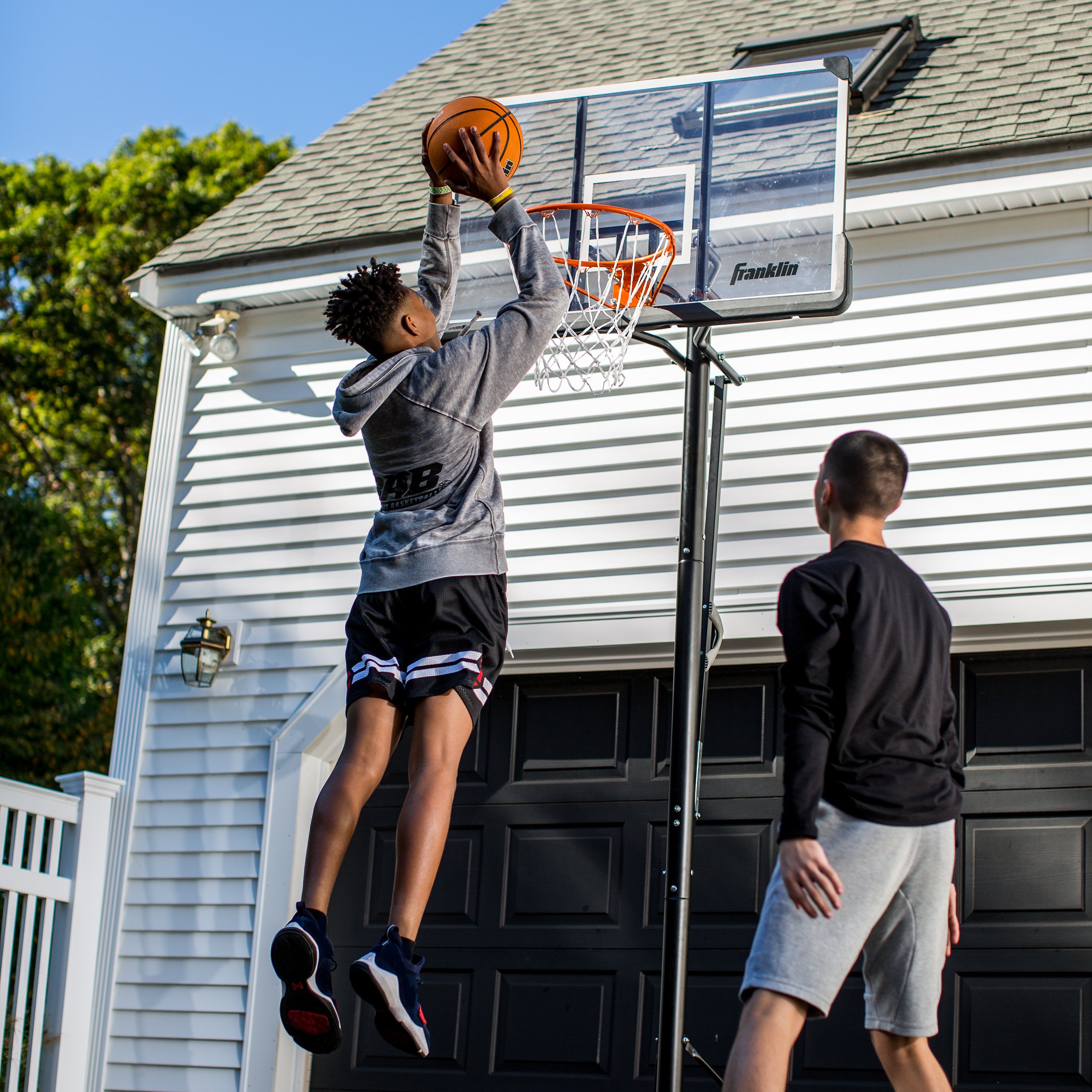 Franklin Sports Portable Basketball Hoop – 48" Adjustable Outdoor Basketball Hoop with Wheels - Authentic Driveway Basketball Hoop Black