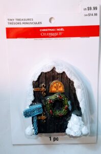 celebrate it 3.5" x 4" handpainted arched wood door with wreath and north sign made out of resin (msrp $9.99)