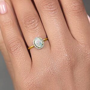 Gem Stone King 10K Yellow Gold 8X6MM Oval Gemstone Birthstone and White Diamond Halo Engagement Ring | Wedding Anniversary Promise Gold Ring For Women | Available In Size 5-10