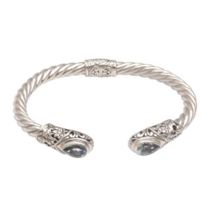 novica artisan handmade blue topaz cuff bracelet silver floral from bali sterling indonesia birthstone 'floral iridescence'