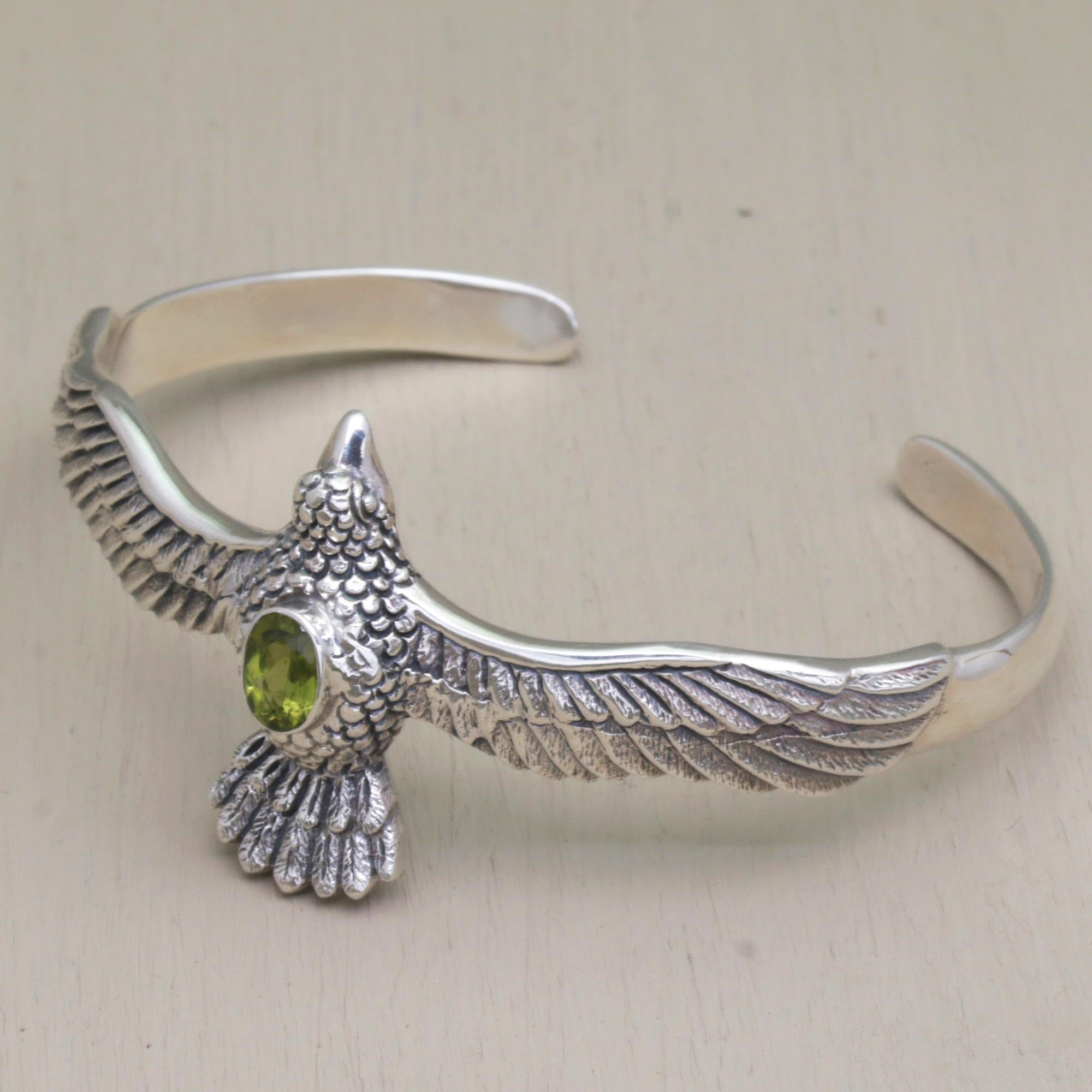 NOVICA Artisan Handmade Peridot Cuff Bracelet Hawk Motif in Sterling Silver Green Indonesia Animal Themed Birthstone Bird [5.75 in L (end to End) x 1.2 in W] ' Spirit Hawk'