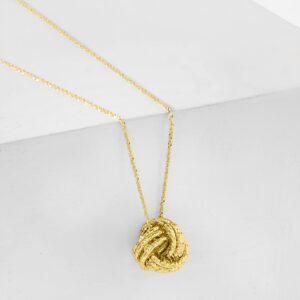 Ross-Simons Italian 14kt Yellow Gold Textured Love Knot Necklace. 18 inches