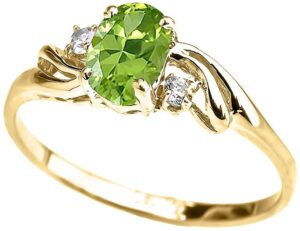 10k yellow gold oval shaped lime green cubic zirconia with round white topaz 3-stone swirl ring - size 7